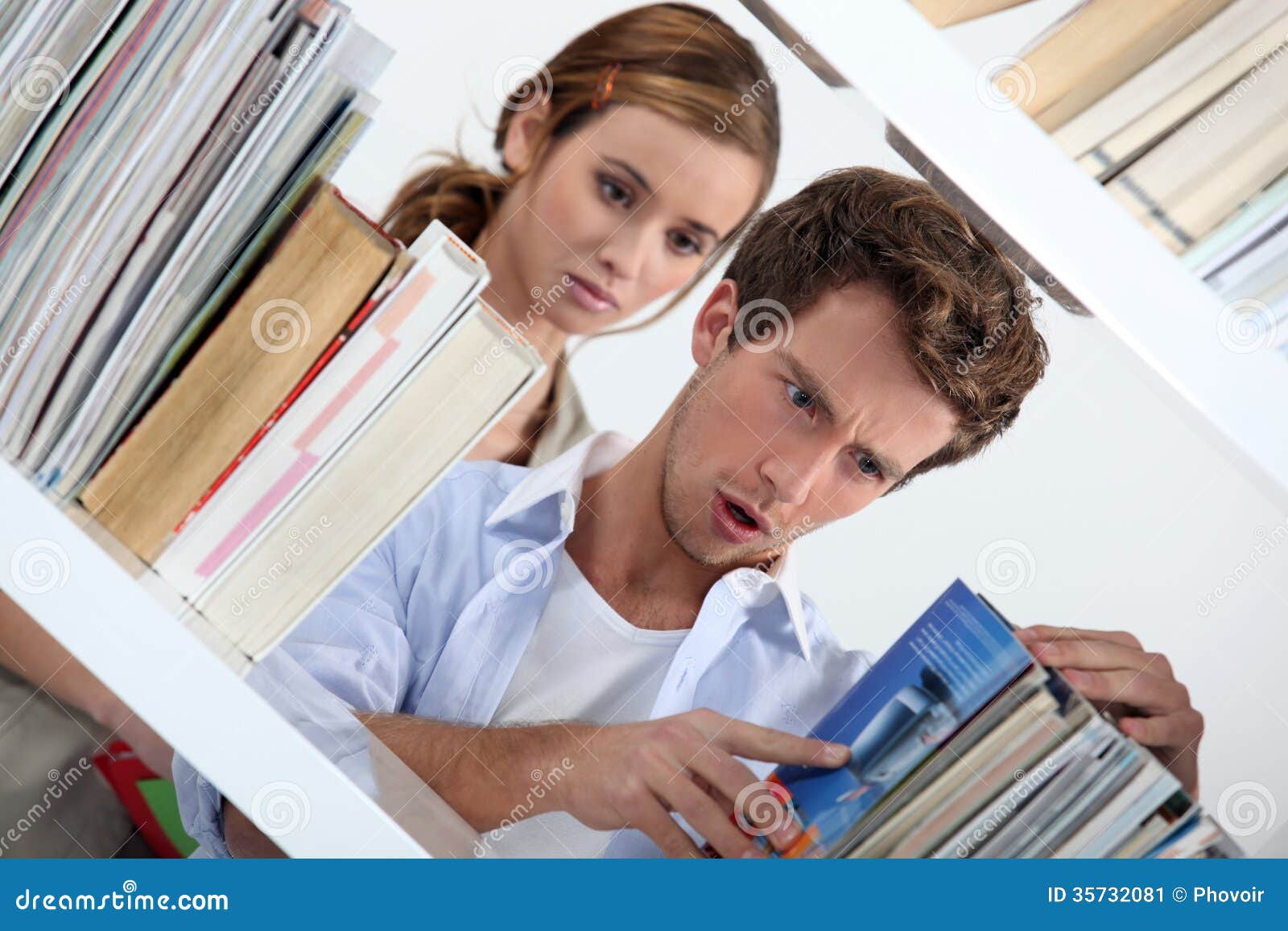 Man looking at books stock image. Image of literature - 35732081