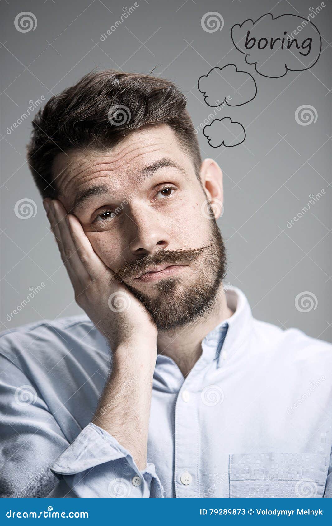 Man is Looking Bored. Over Gray Background Stock Image - Image of ...