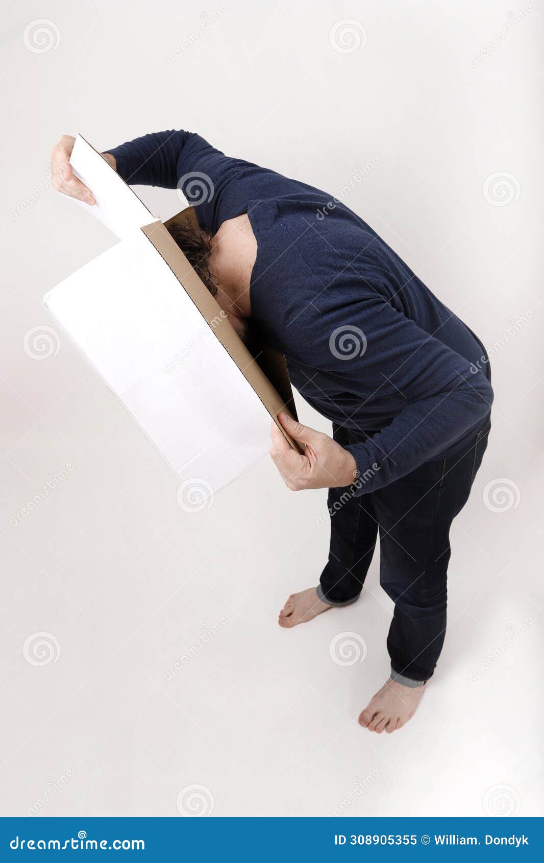 Man Looking into a Box on a White Background Stock Image - Image of ...