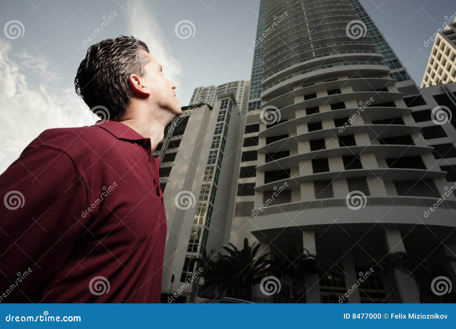 Man looking at a building stock photo. Image of male, towering - 8477000