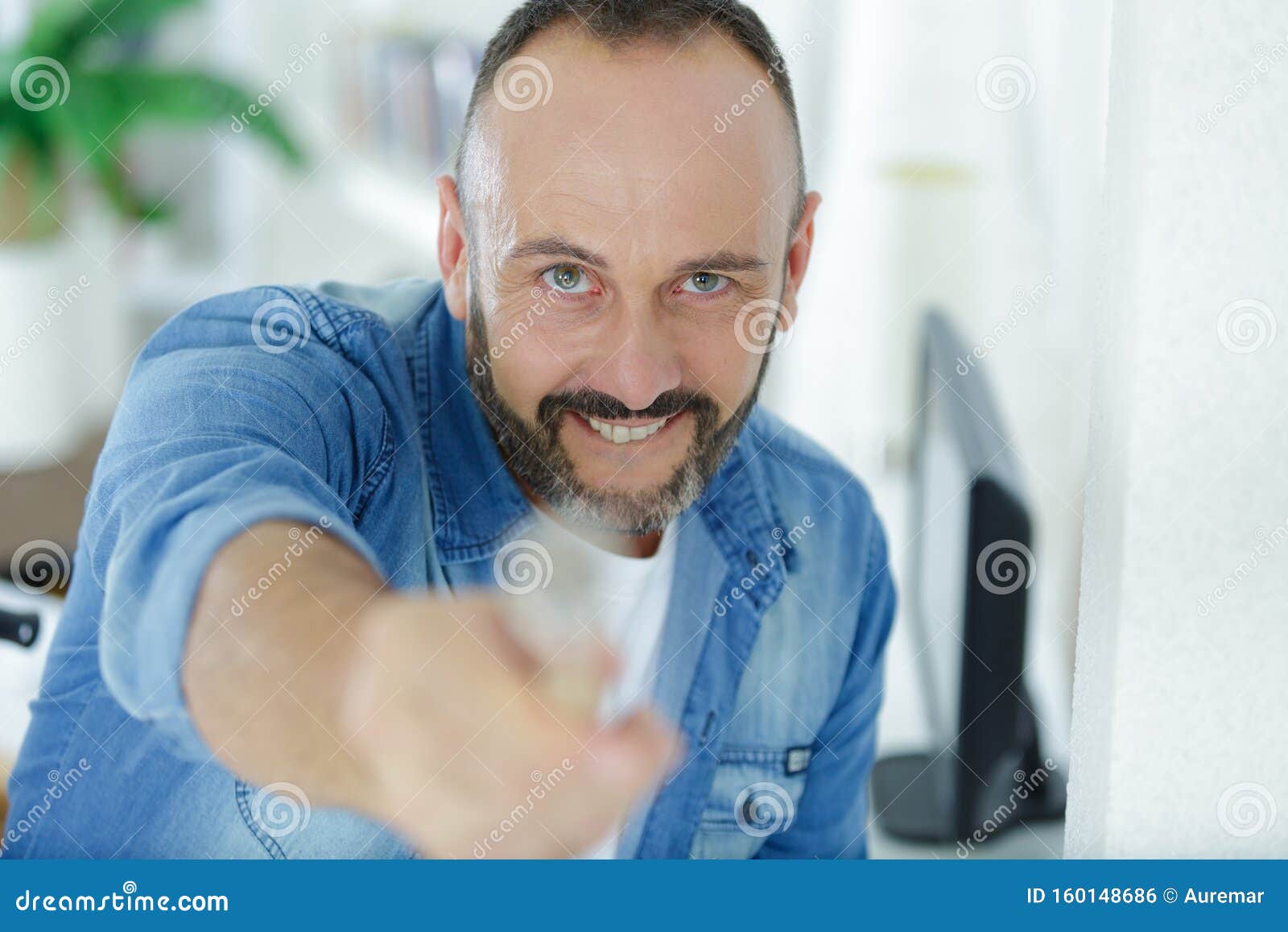 Man Looking into Camera in Urban Settings Stock Photo - Image of ...