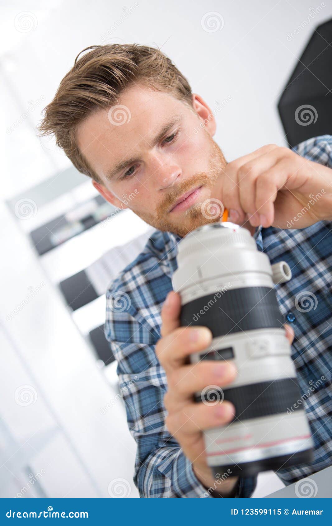 Man looking at camera zoom stock image. Image of photograph - 123599115