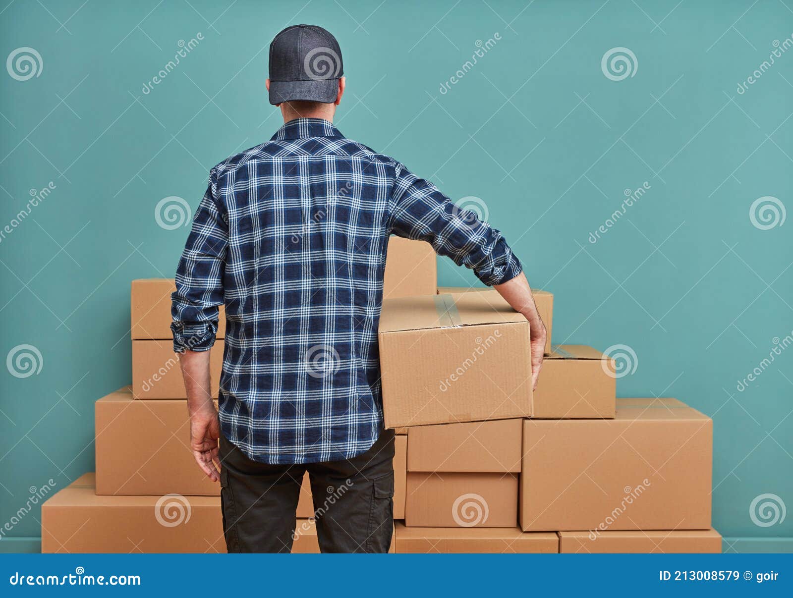Man Looking at Cardboard Boxes Stock Image - Image of expertise ...