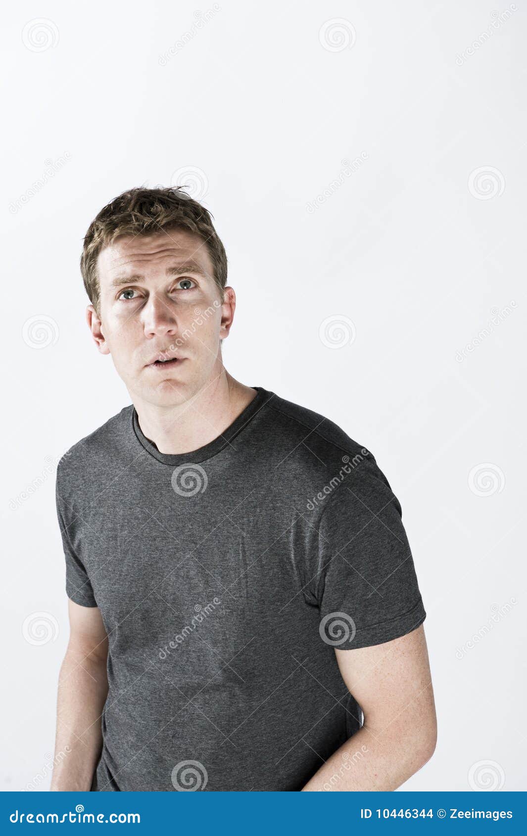 Man Looking at Ceiling stock photo. Image of shocked - 10446344