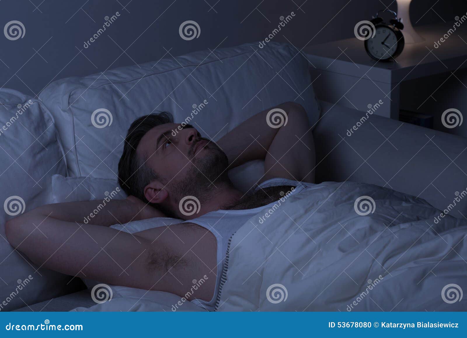 Man looking at the ceiling stock photo. Image of awake - 53678080