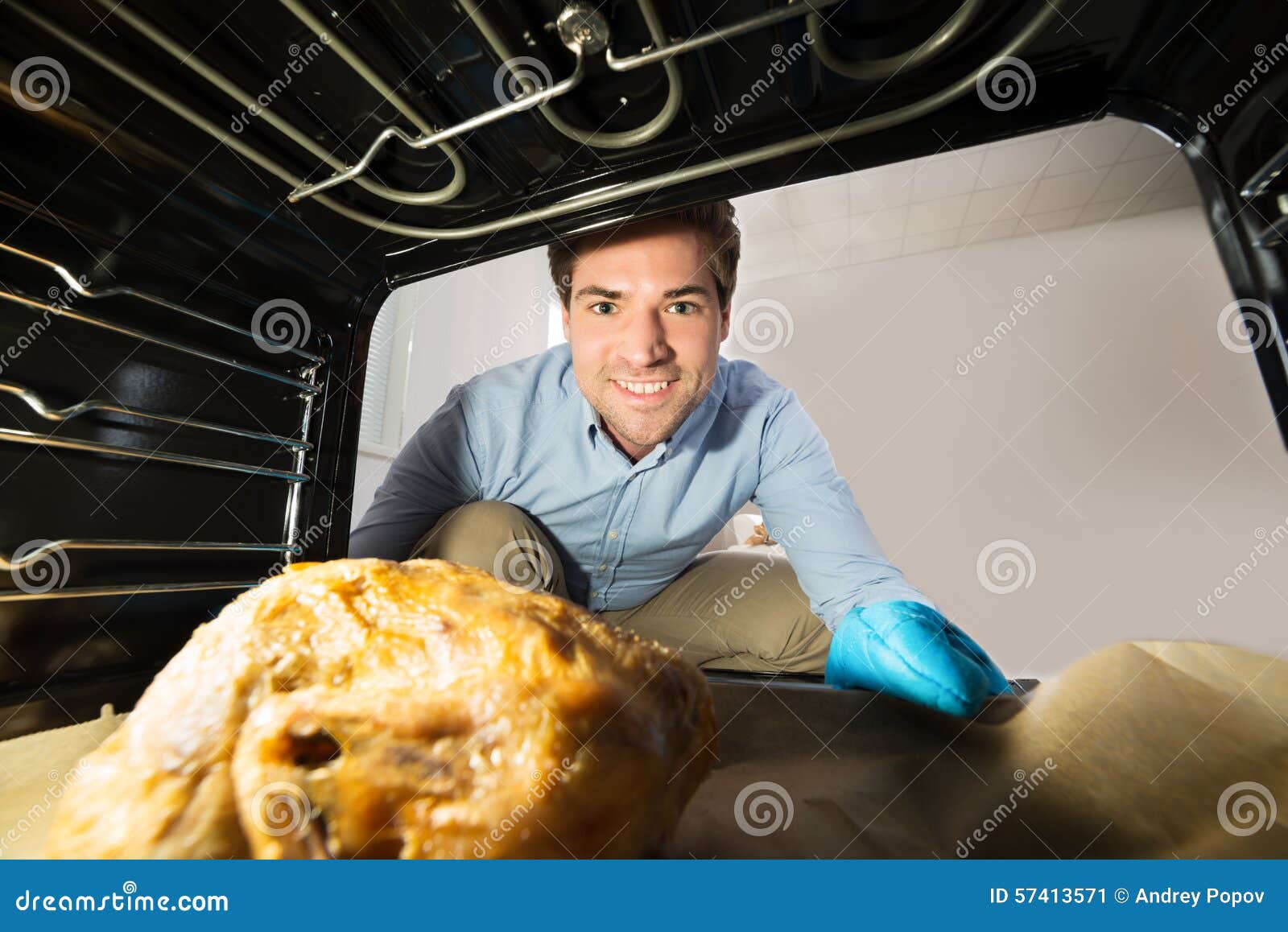 Man Looking at Chicken View from Inside the Oven Stock Image - Image of ...