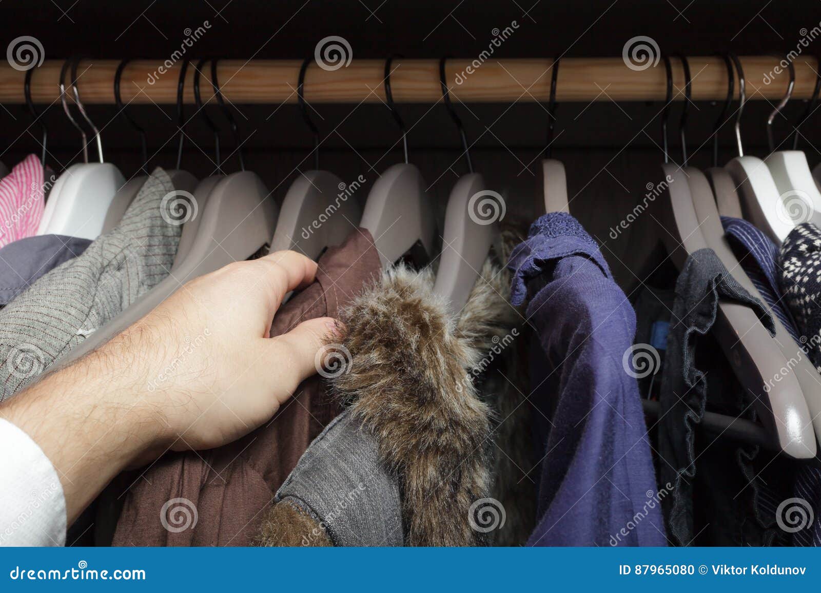 Man Looking for Clothes, Rummaging in the Cupboard Stock Photo - Image ...