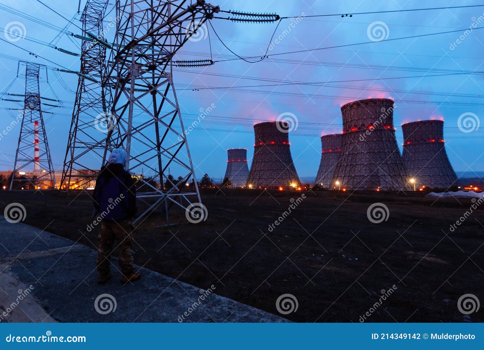 Man Looking at Cooling Towers of Nuclear Power Plant at Night Stock ...