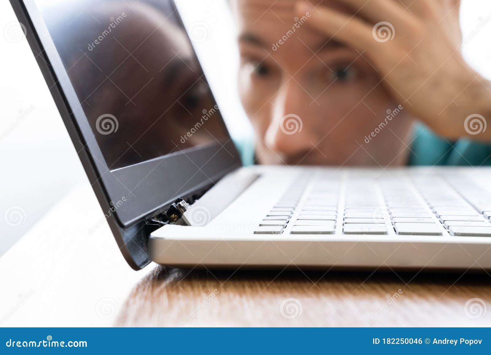 Man Looking at Damaged Laptop Computer Stock Photo - Image of industry ...