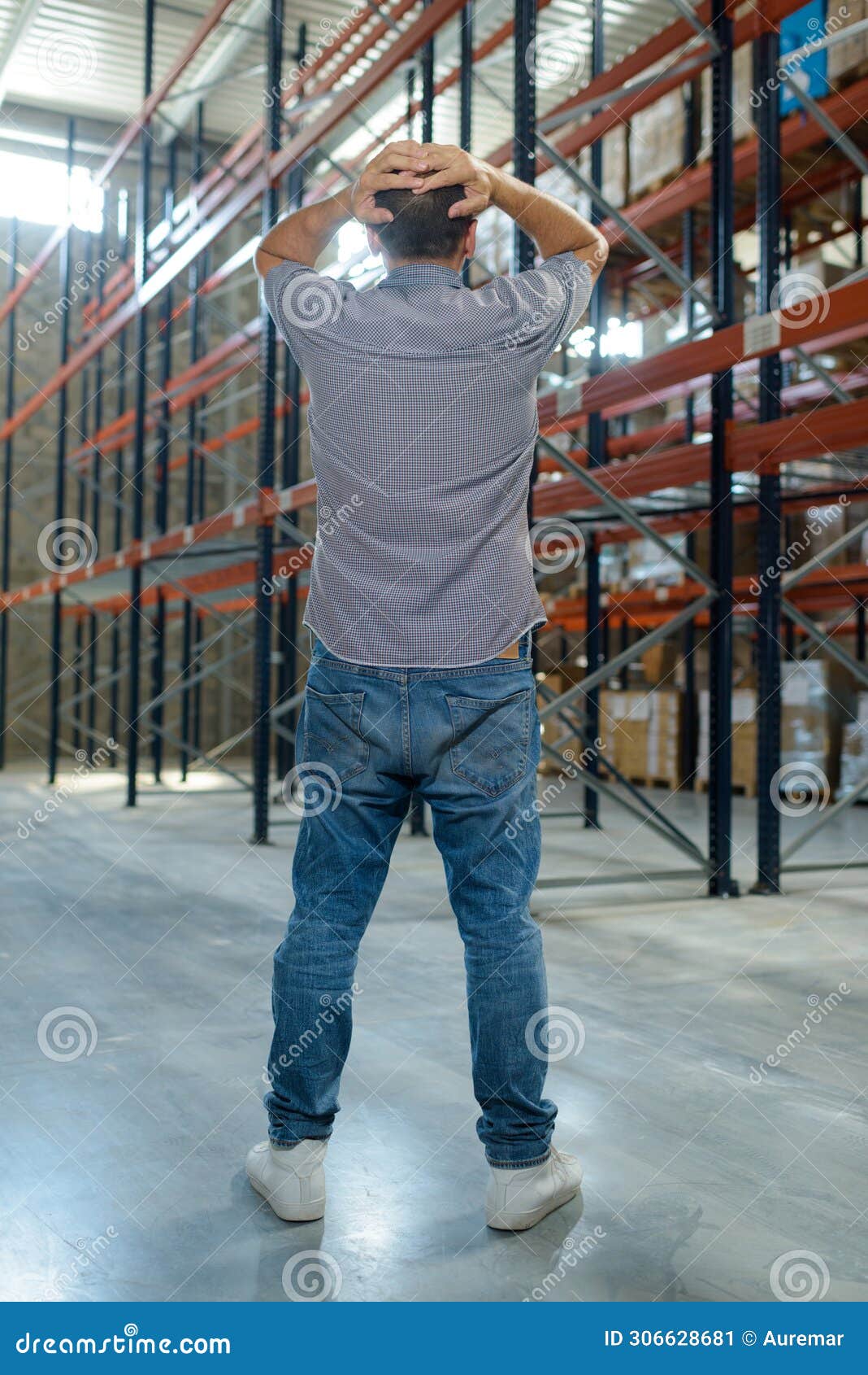 Man Looking in Despair at Empty Racking in Warehouse Stock Image ...