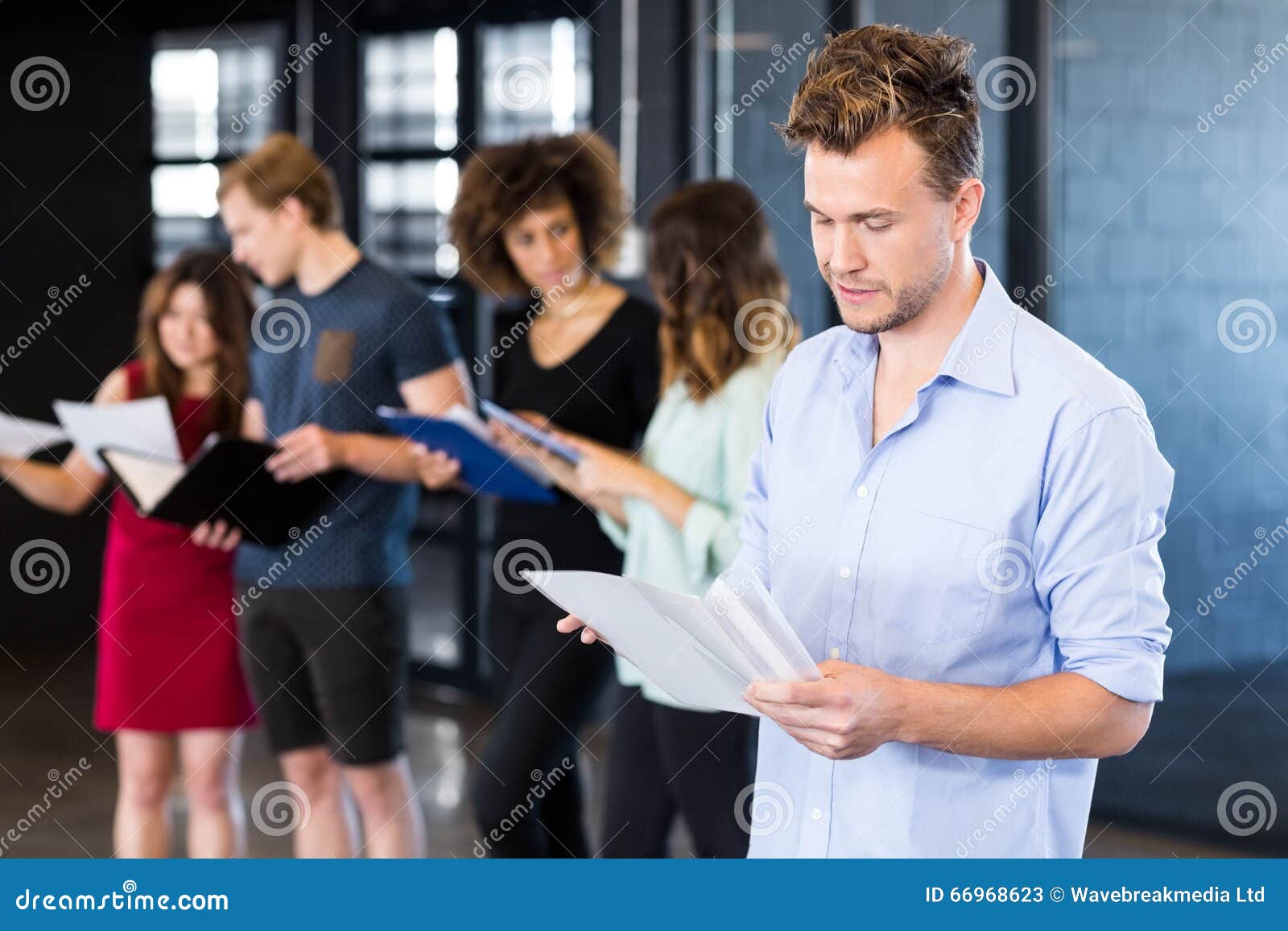 Man looking at document stock image. Image of handsome - 66968623