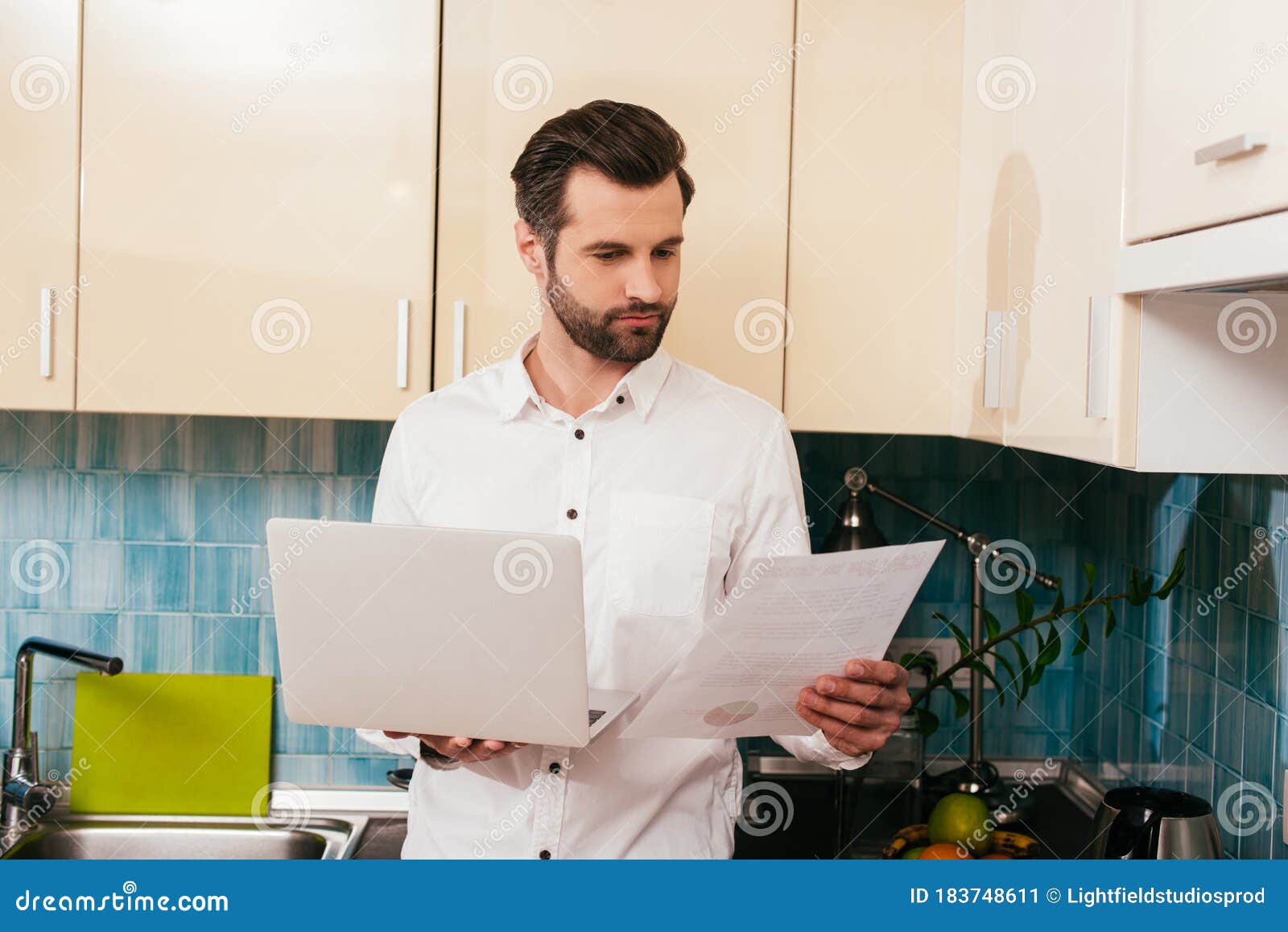 Handsome Man Looking at Document and Stock Image - Image of adult ...