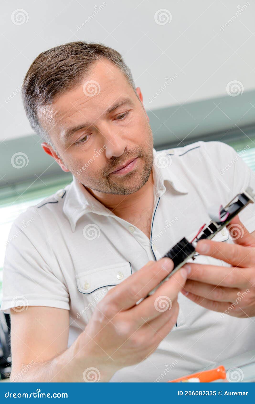 Man Looking at Electrical Component Stock Image - Image of programming ...
