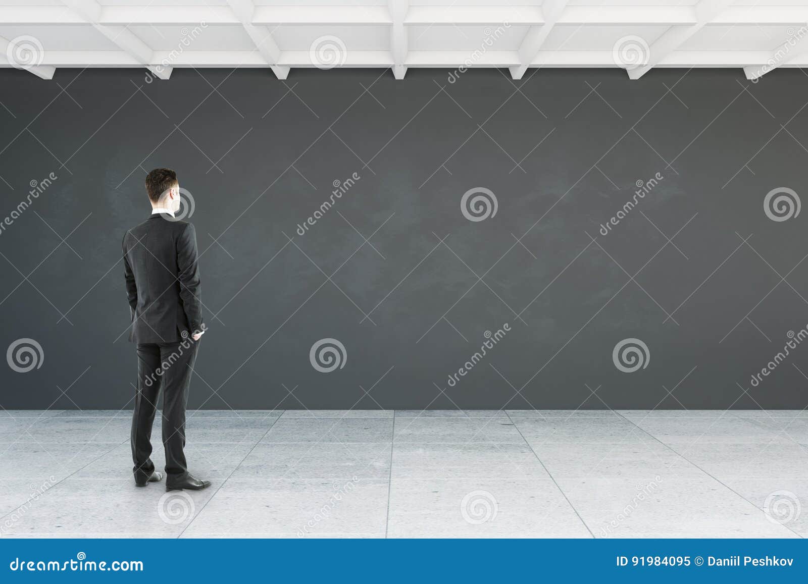 Man looking at empty wall stock image. Image of looking - 91984095
