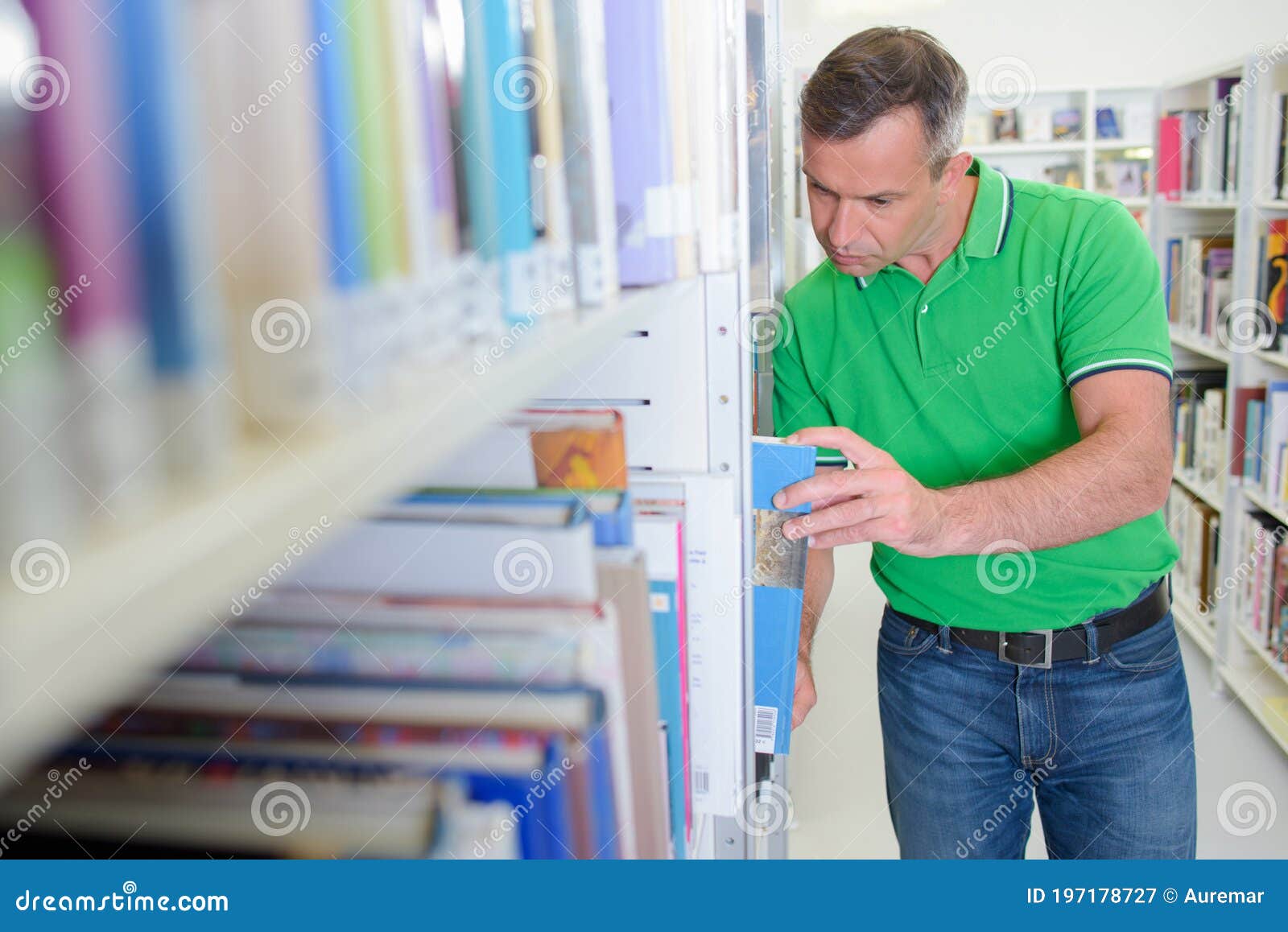 Man looking for file stock image. Image of office, casual - 197178727
