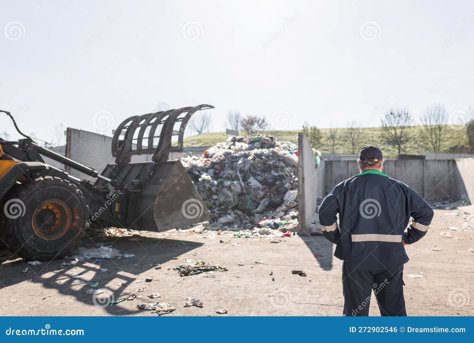 Man Looking at Garbage at Landfill Stock Photo - Image of male, people ...