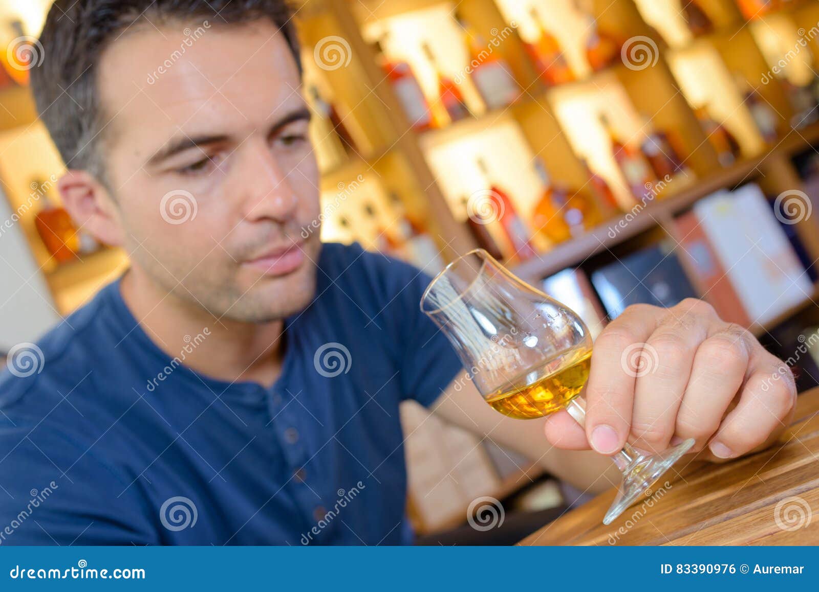Man Looking into Glass Alcohol Stock Photo - Image of strong, snifter ...