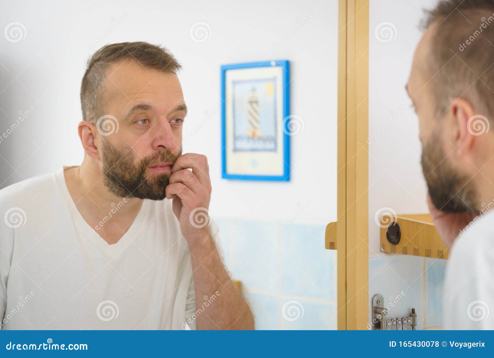 Man Looking at Himself in Mirror Stock Photo - Image of looking ... Man Looking at Himself in Mirror Stock Photo - Image of looking ...
