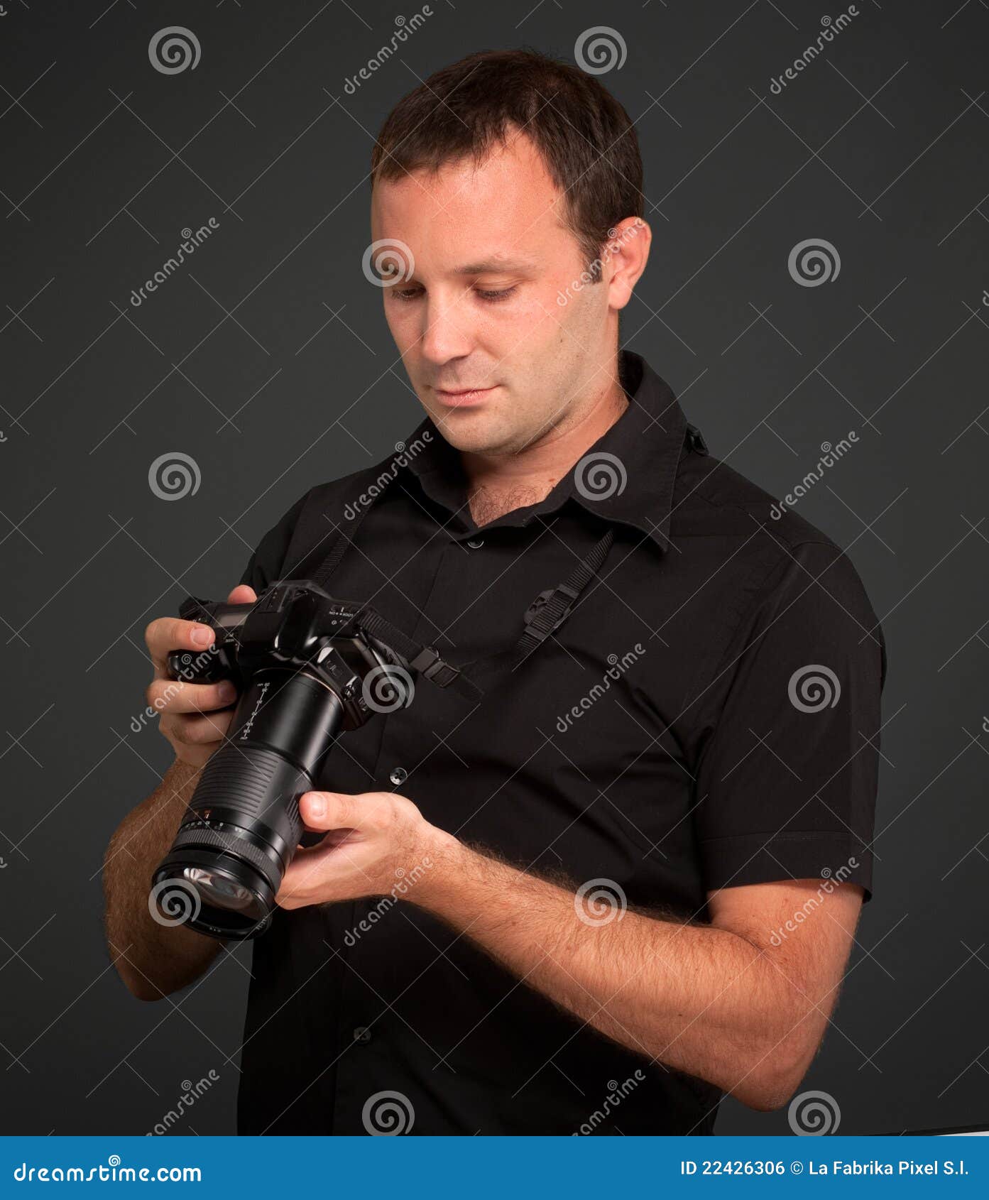 Man looking at his camera stock photo. Image of professional - 22426306