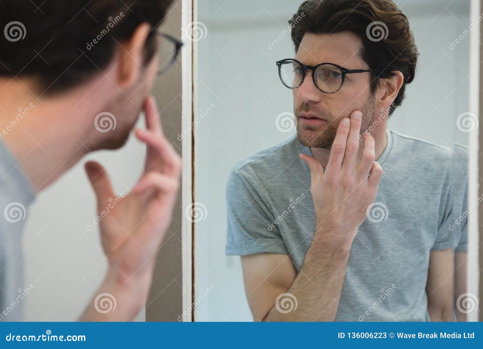 Man Looking His Face in Mirror Stock Image - Image of clothing ...