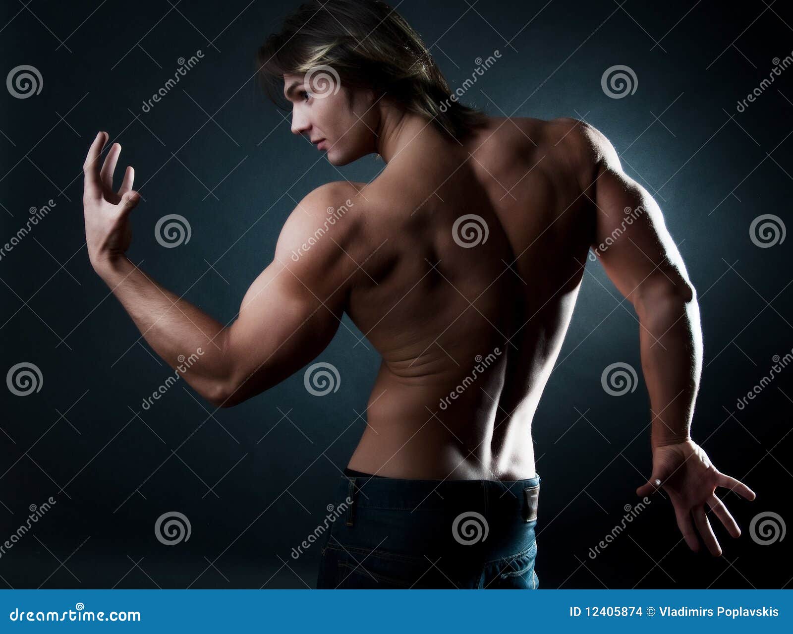 Man looking on his hand stock photo. Image of bodybuilder - 12405874