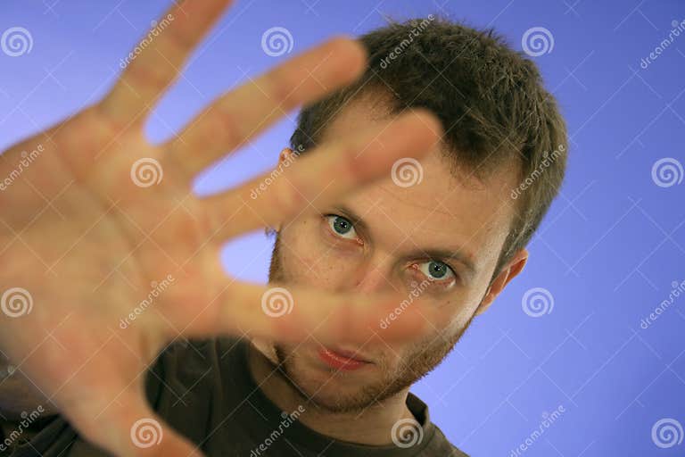 Man Looking through His Hand Stock Image - Image of serious, concept ...