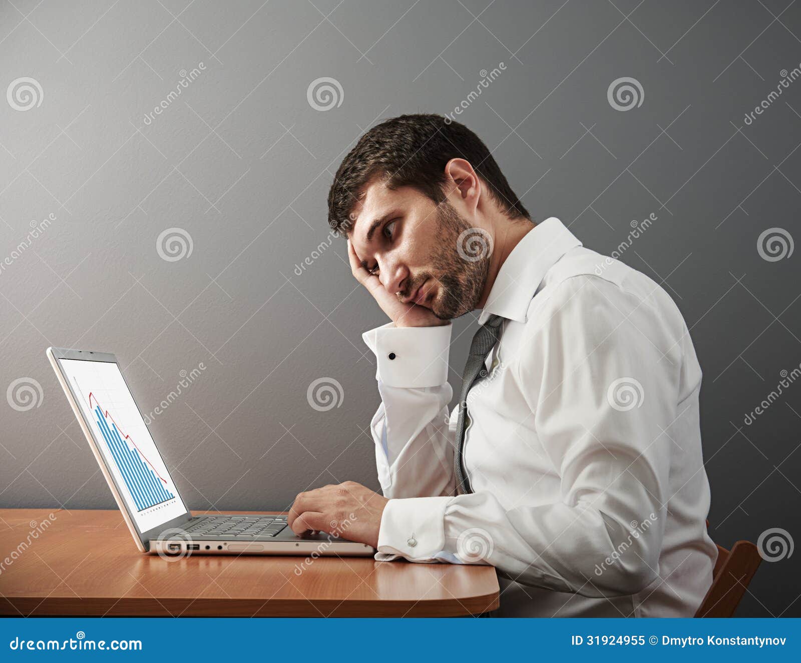 Man looking at his laptop stock image. Image of network - 31924955