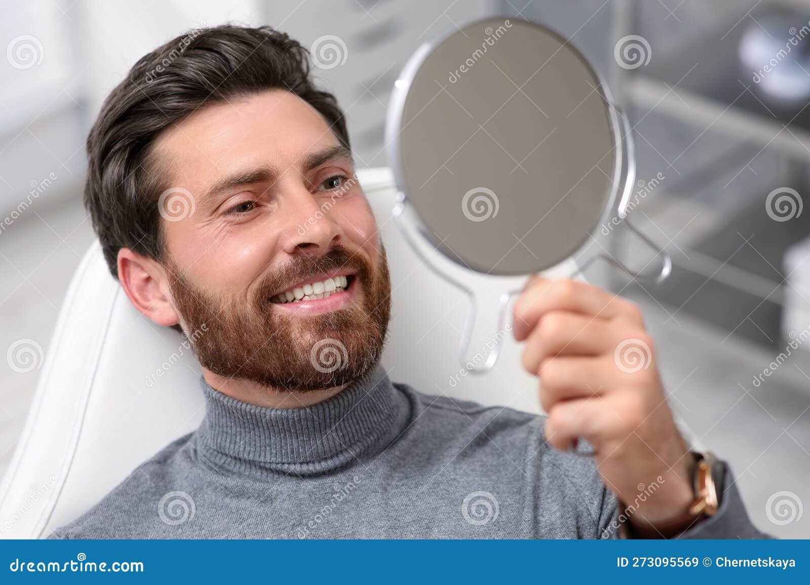 Man Looking at His New Dental Implants in Mirror Indoors Stock Image ...