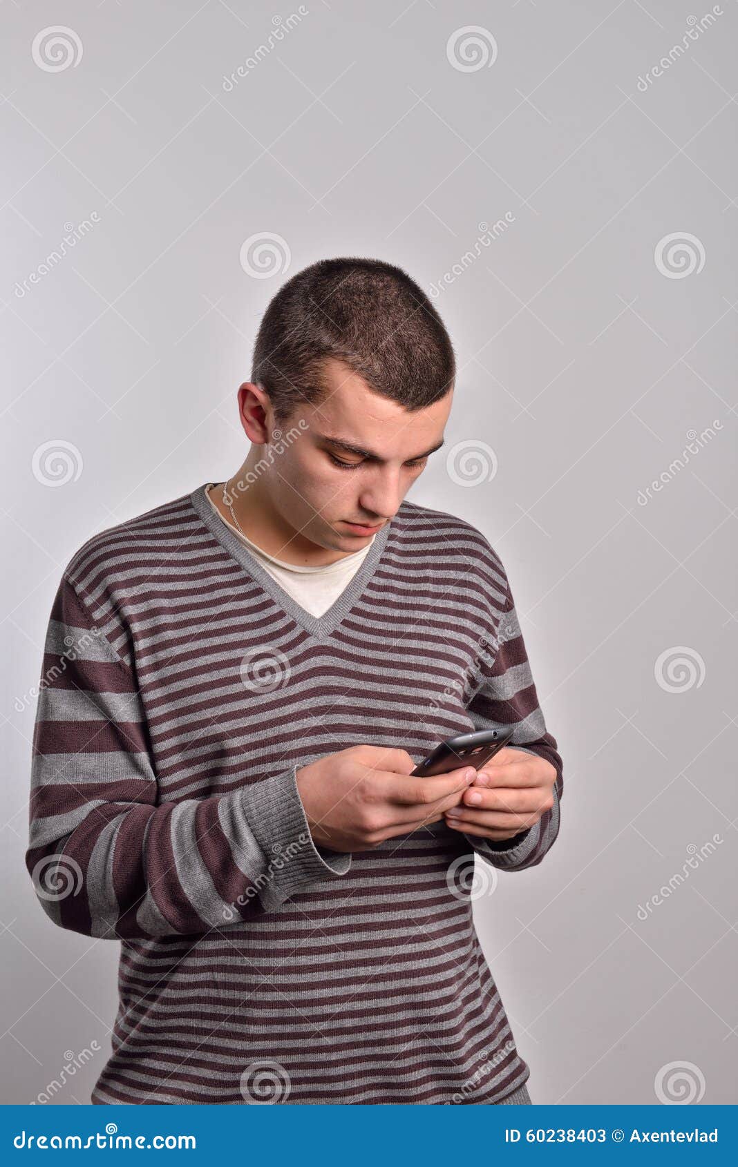 Man Looking at His Smart Phone while Text Messaging Stock Image - Image ...