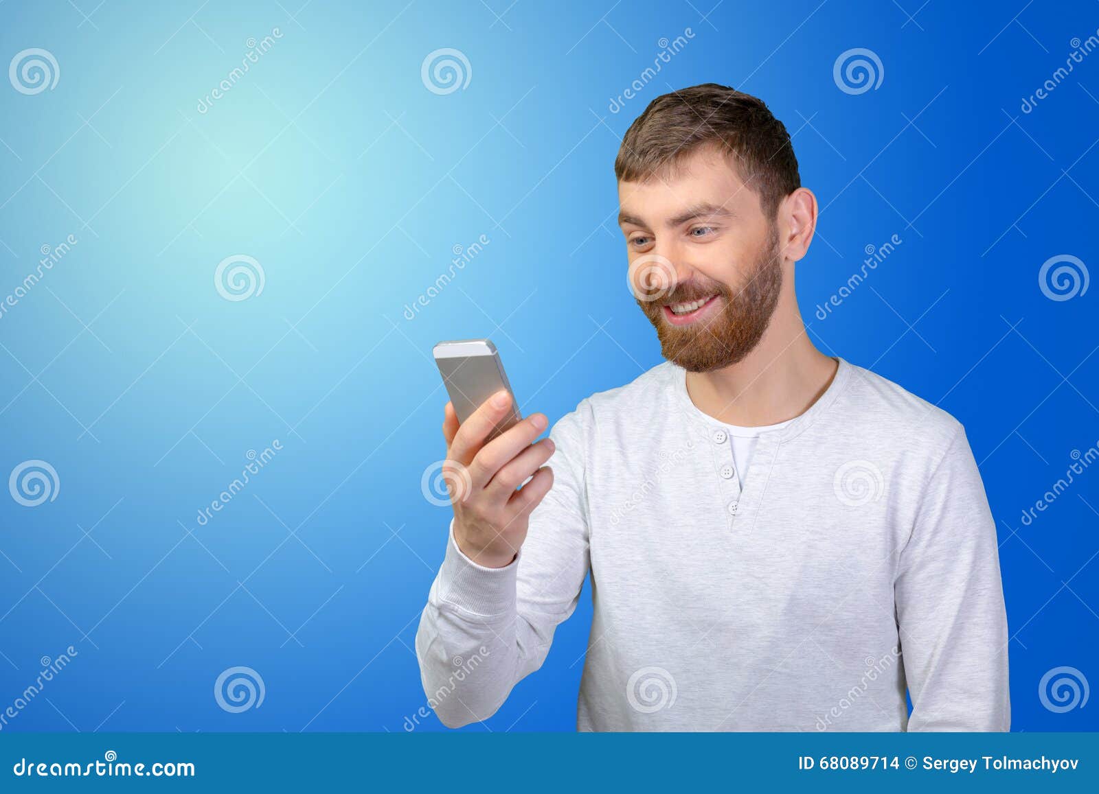 Man Looking at His Smartphone Stock Photo - Image of cellular ...
