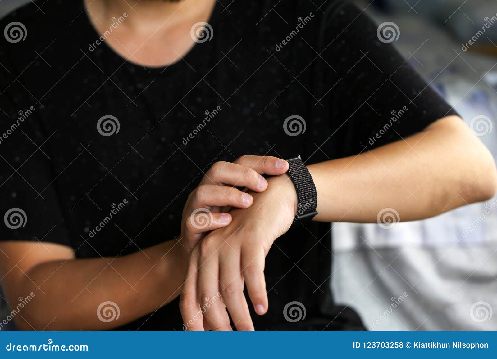 Man Looking at His Watch on His Hand, Watching the Time Using for ...