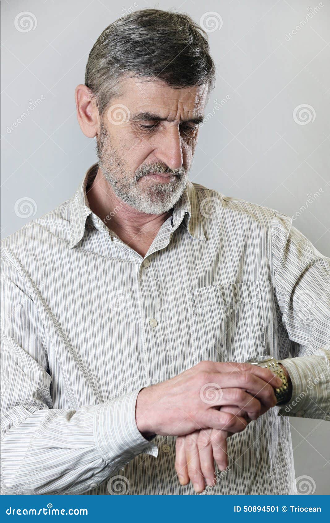 Man looking at his watch stock image. Image of manager - 50894501