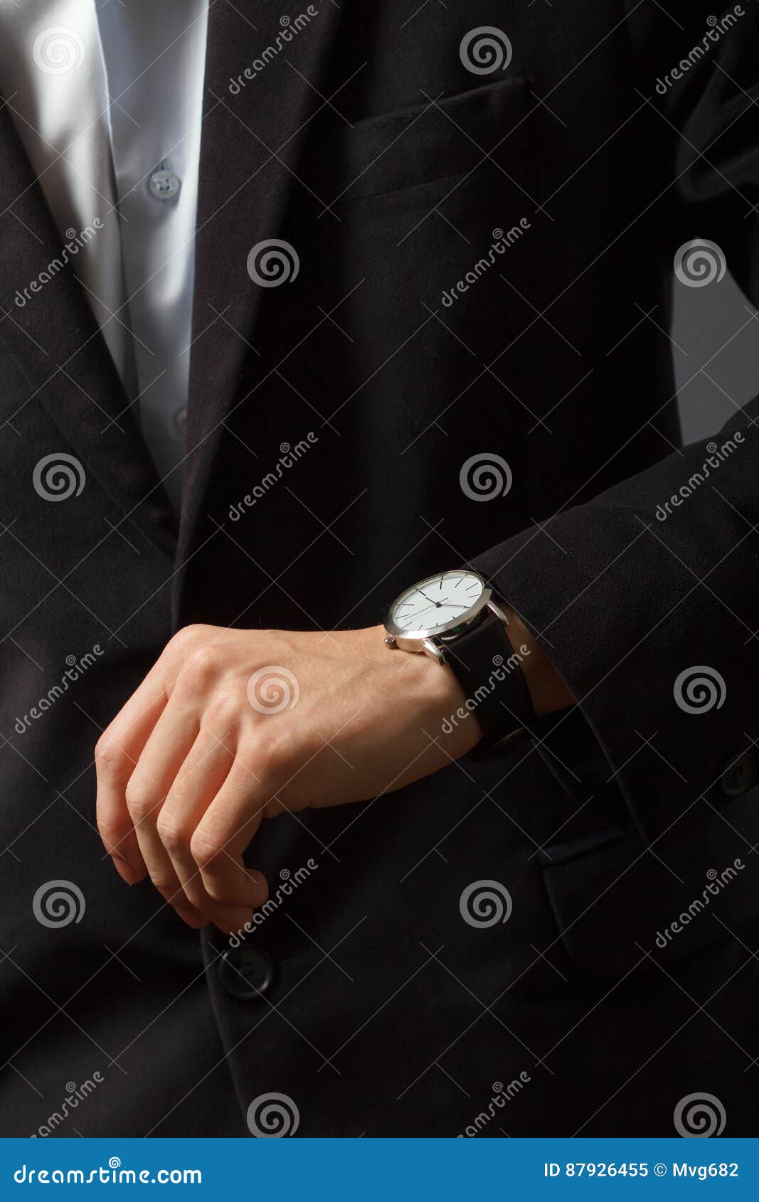 Man is Looking at His Watch Stock Image - Image of adult, hand: 87926455