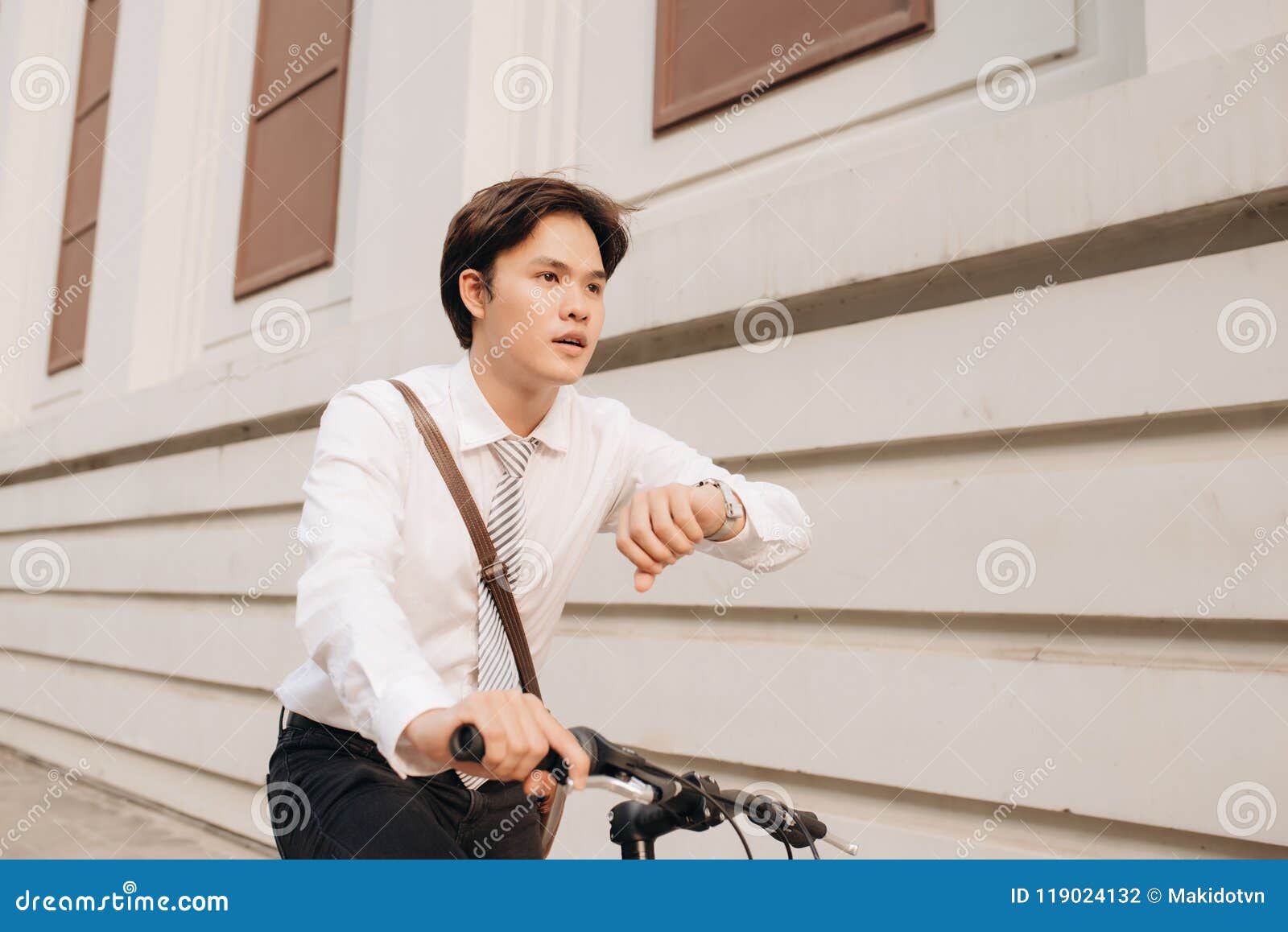 Man Looking at His Watch while Waiting Stock Photo - Image of checking ...