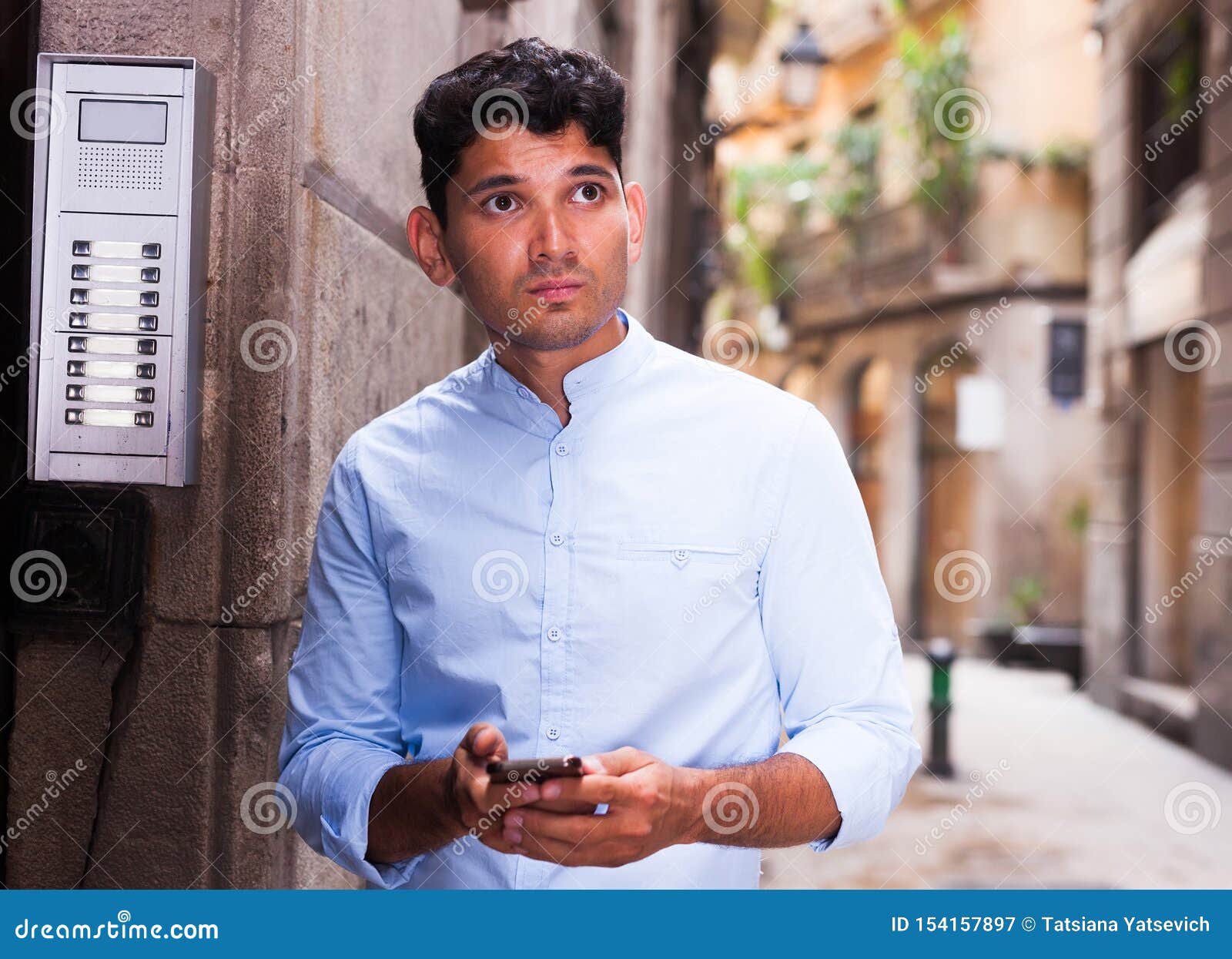 Man Looking for House at the Right Address in City Stock Image - Image ...