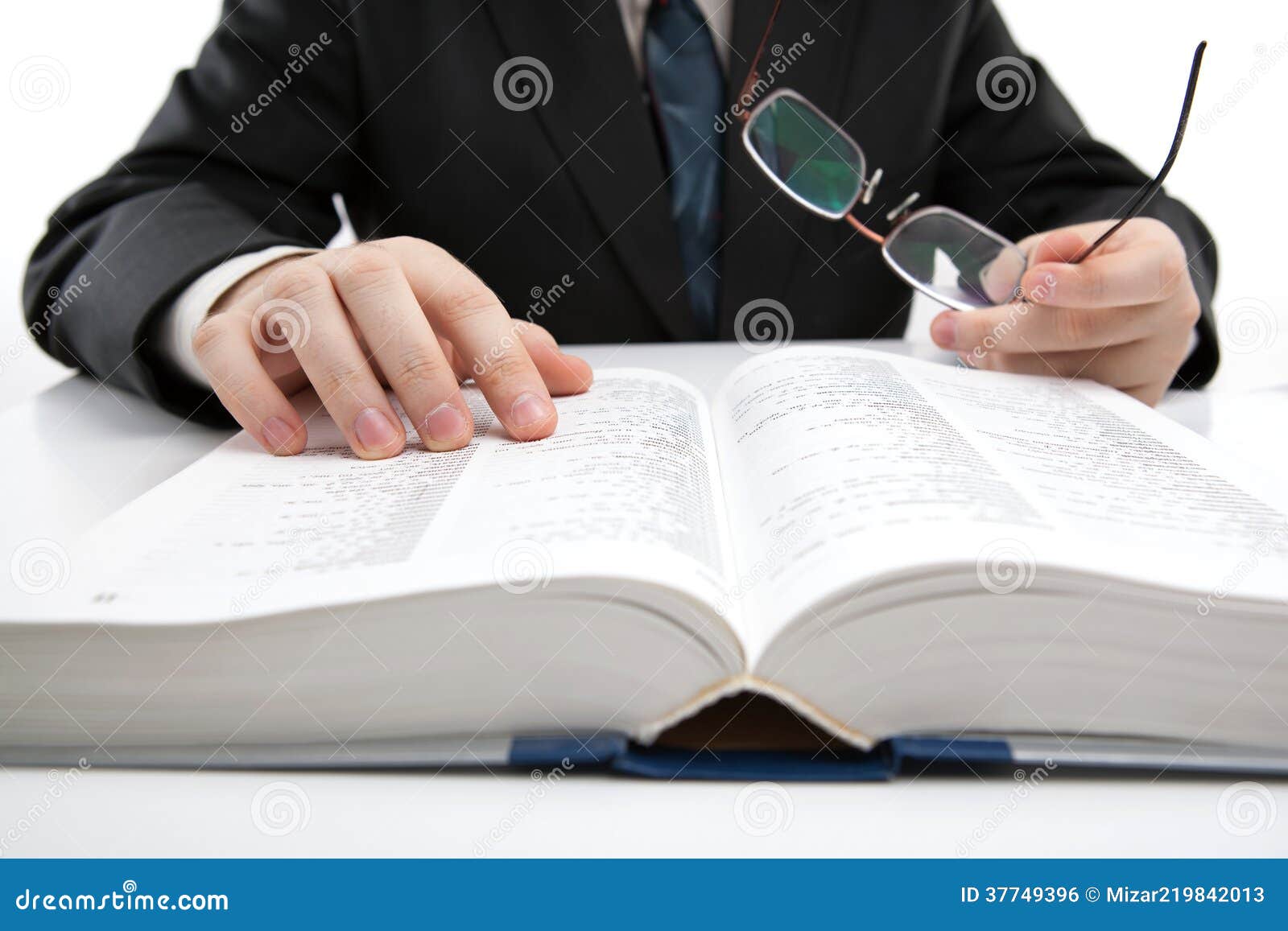 Man is Looking for Information in the Dictionary Stock Photo - Image of ...