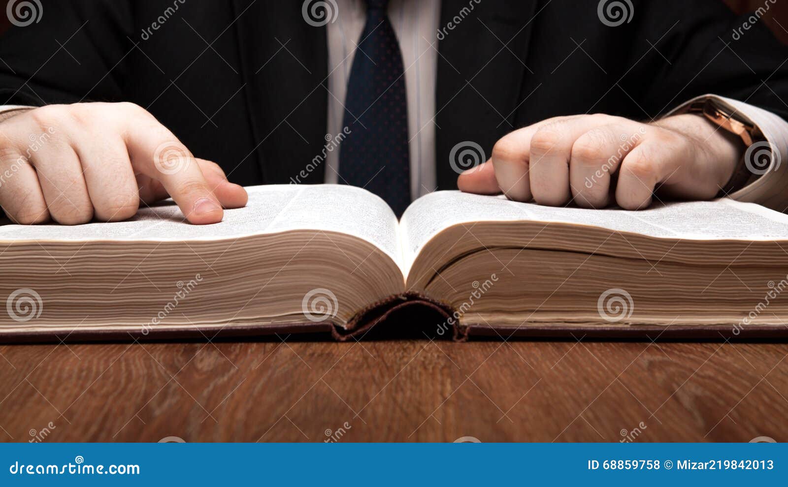 Man is Looking for Information in the Dictionary Stock Photo - Image of ...
