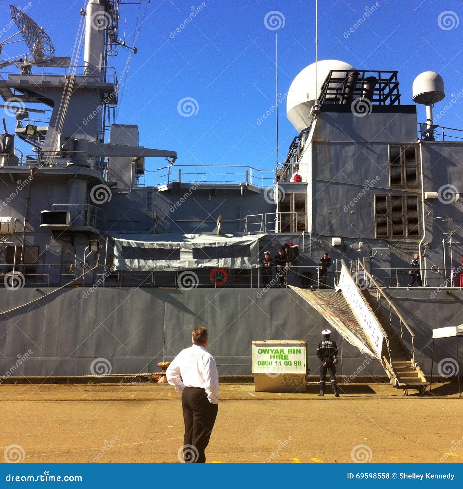 Man Looking at Large Navy Ship in Wellington Harbour Editorial Stock ...