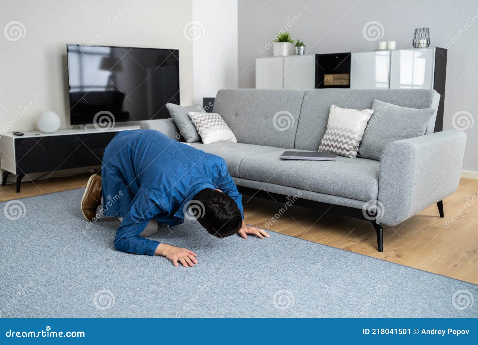 Man Looking for Lost Keys stock image. Image of remote - 218041501