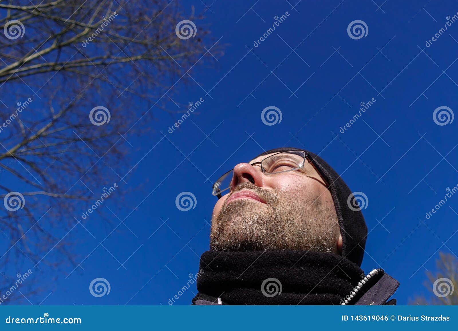 Man looking, low angle stock photo. Image of sunny, blue - 143619046