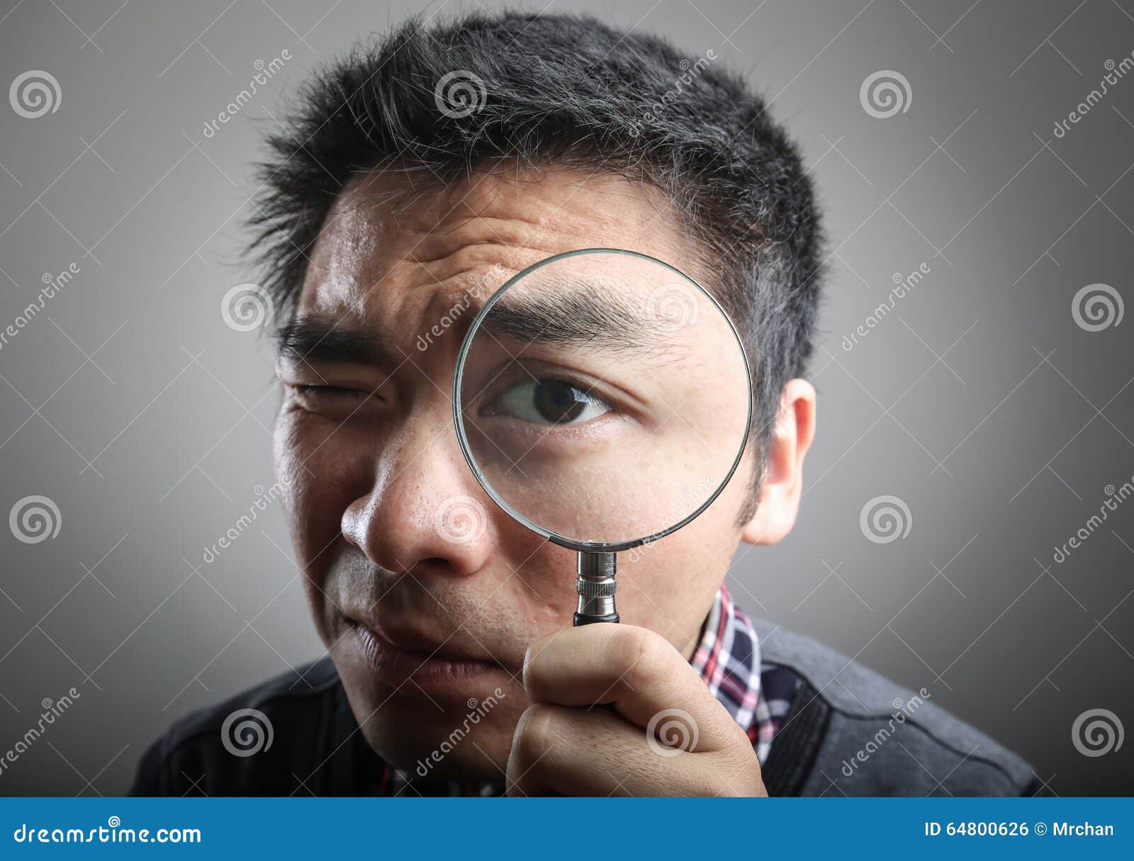 Man Looking through a Magnifying Glass Stock Photo - Image of sight ...