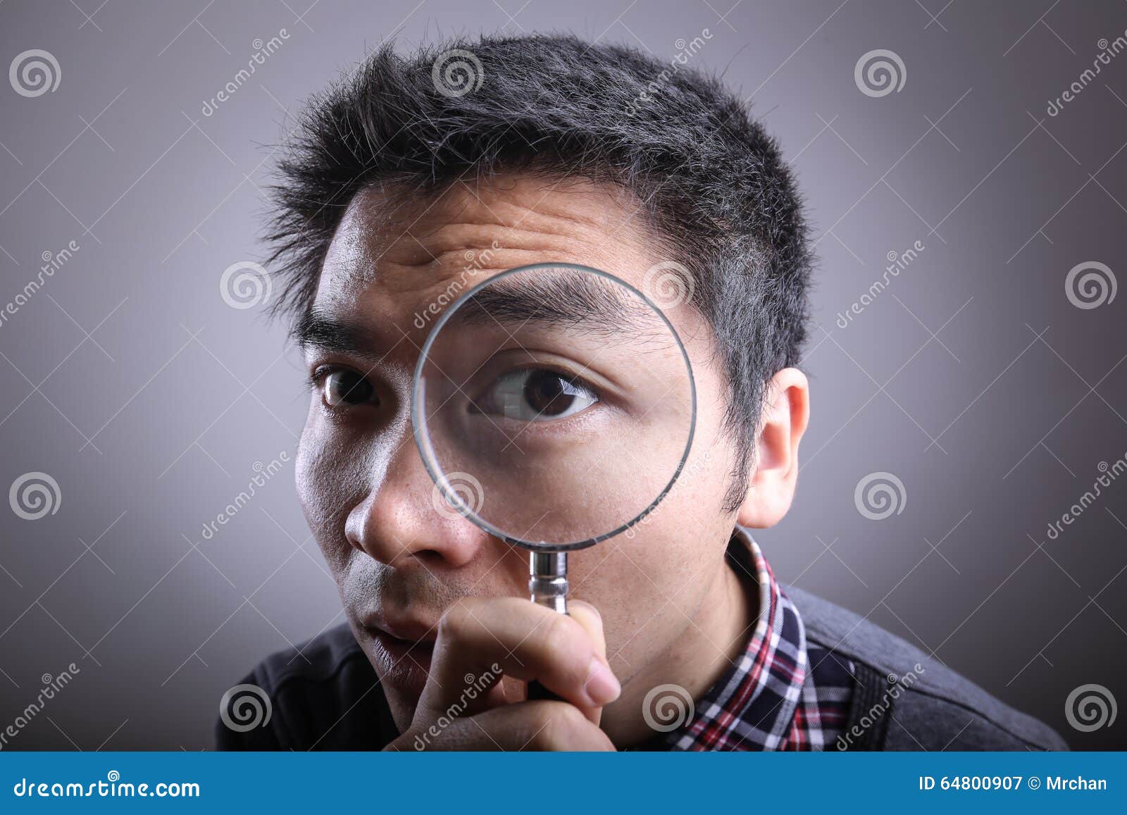Man Looking through a Magnifying Glass Stock Image - Image of curious ...
