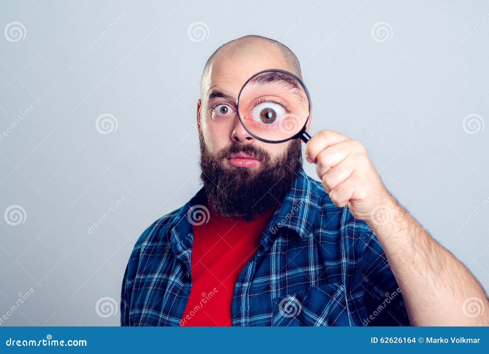 Man is Looking through Magnifying Glass Stock Photo - Image of handsome ...