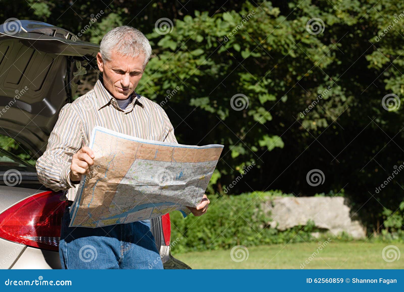 Man looking at map stock image. Image of horizontal, leisure - 62560859