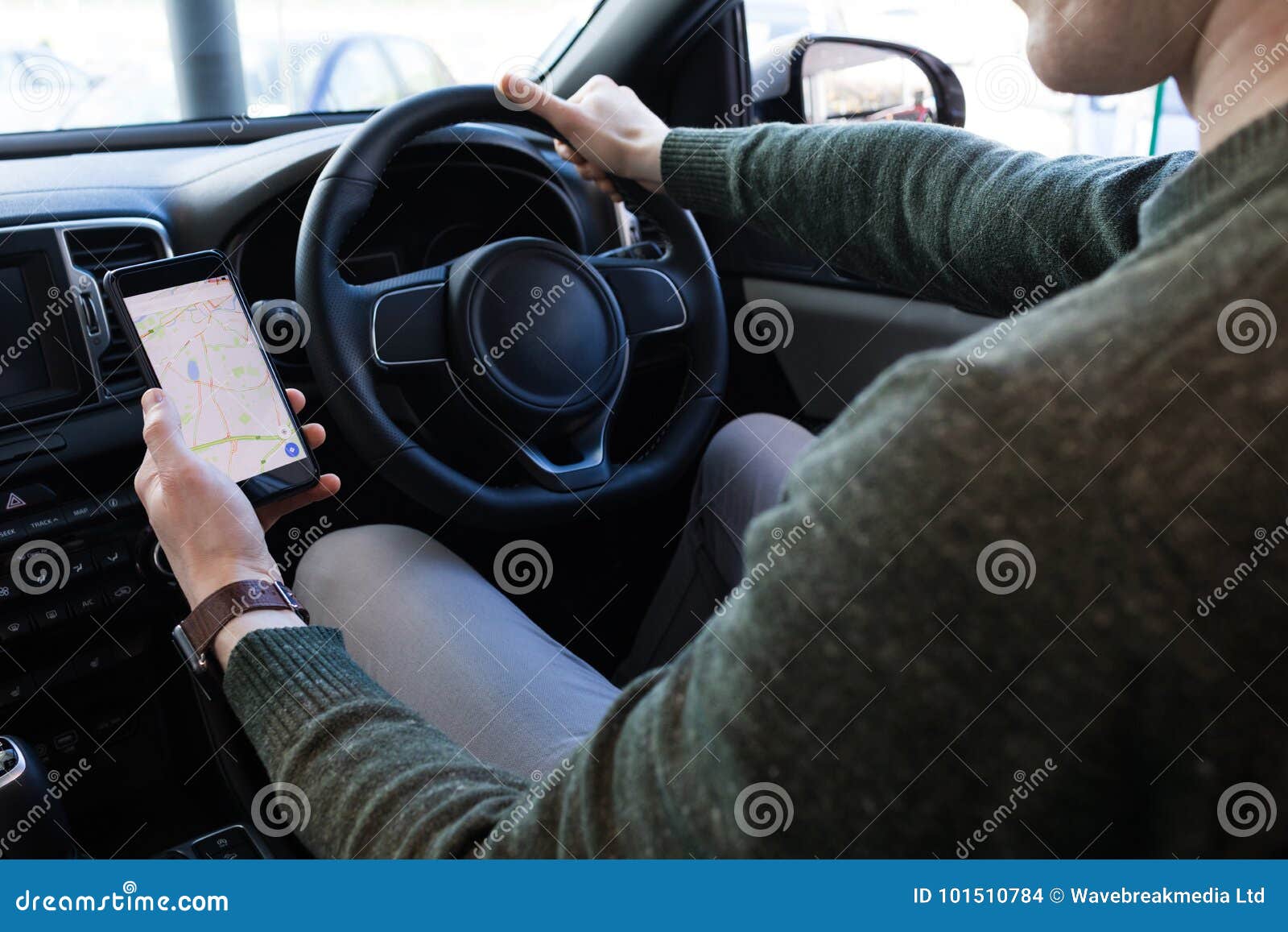 Man Using Smartphone while Driving Car Stock Photo - Image of guidance ...