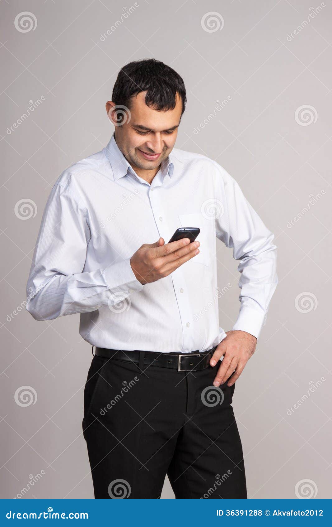 Man Looking at Mobile Phone Stock Photo - Image of formal, businessman ...