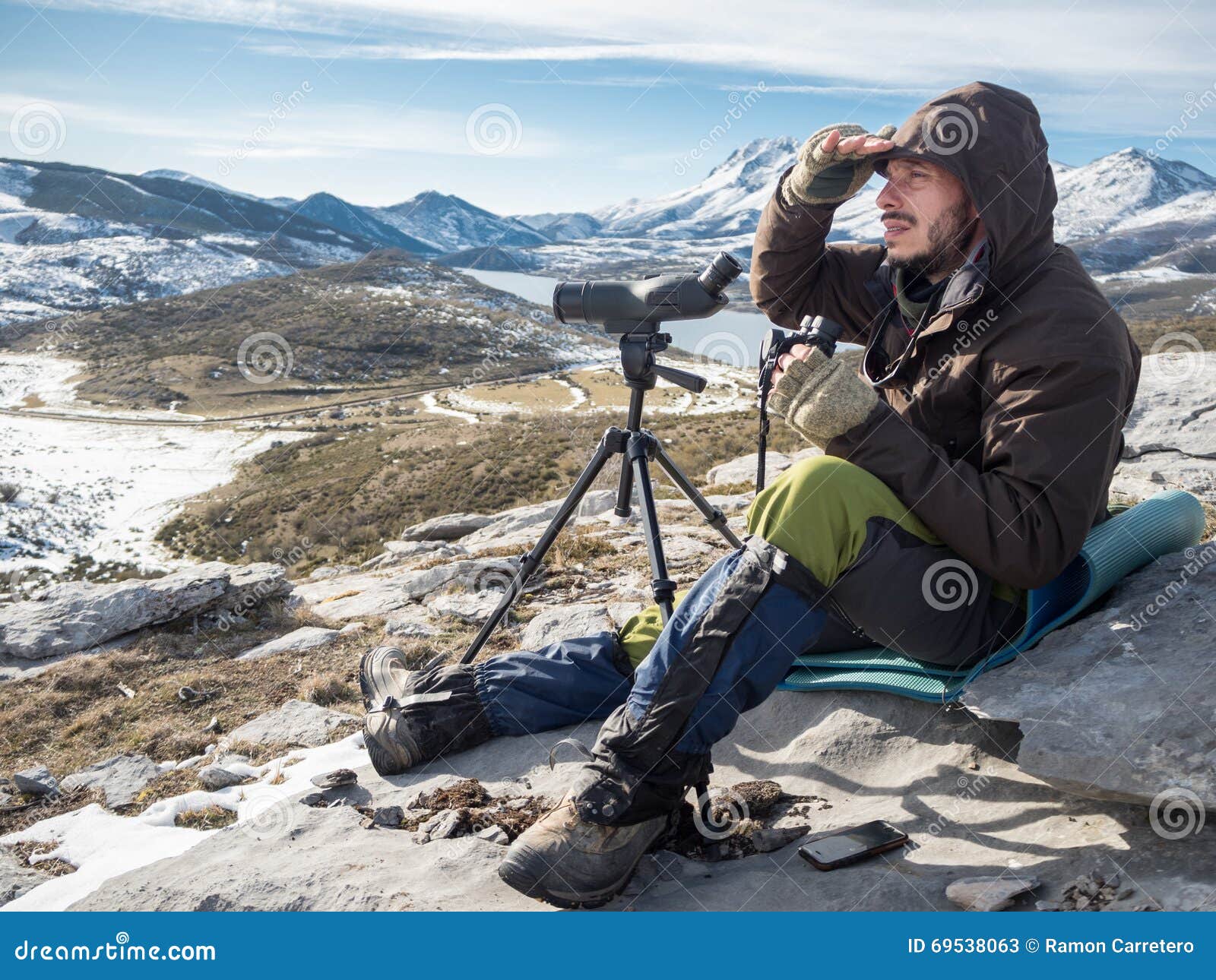 Man Looking in the Mountains with Binoculars and Telescope Stock Image ...