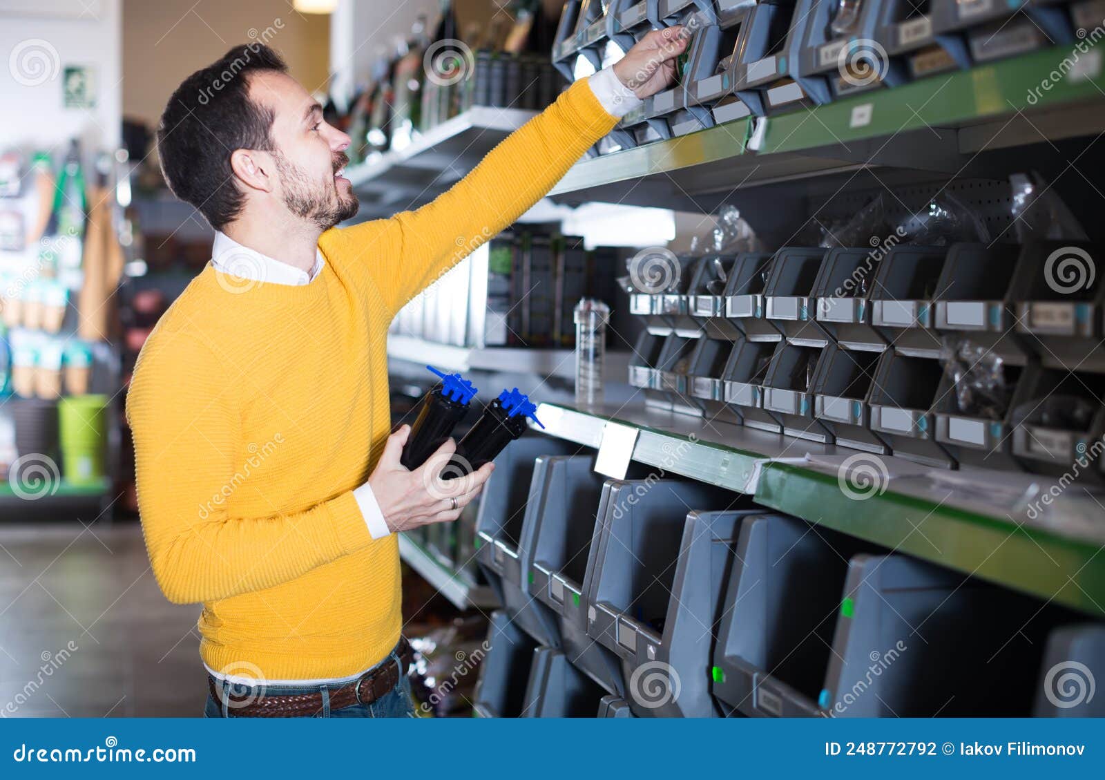 Man is Looking for the Necessary Garden Tools Stock Photo - Image of ...
