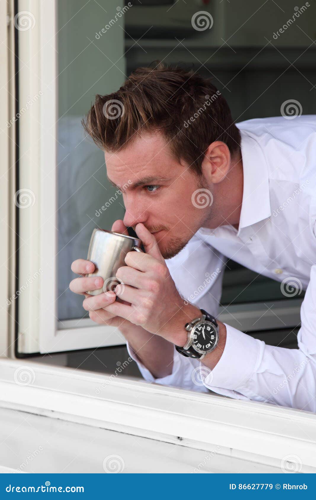 Man Looking Out of a Window Stock Image - Image of comfortable ...