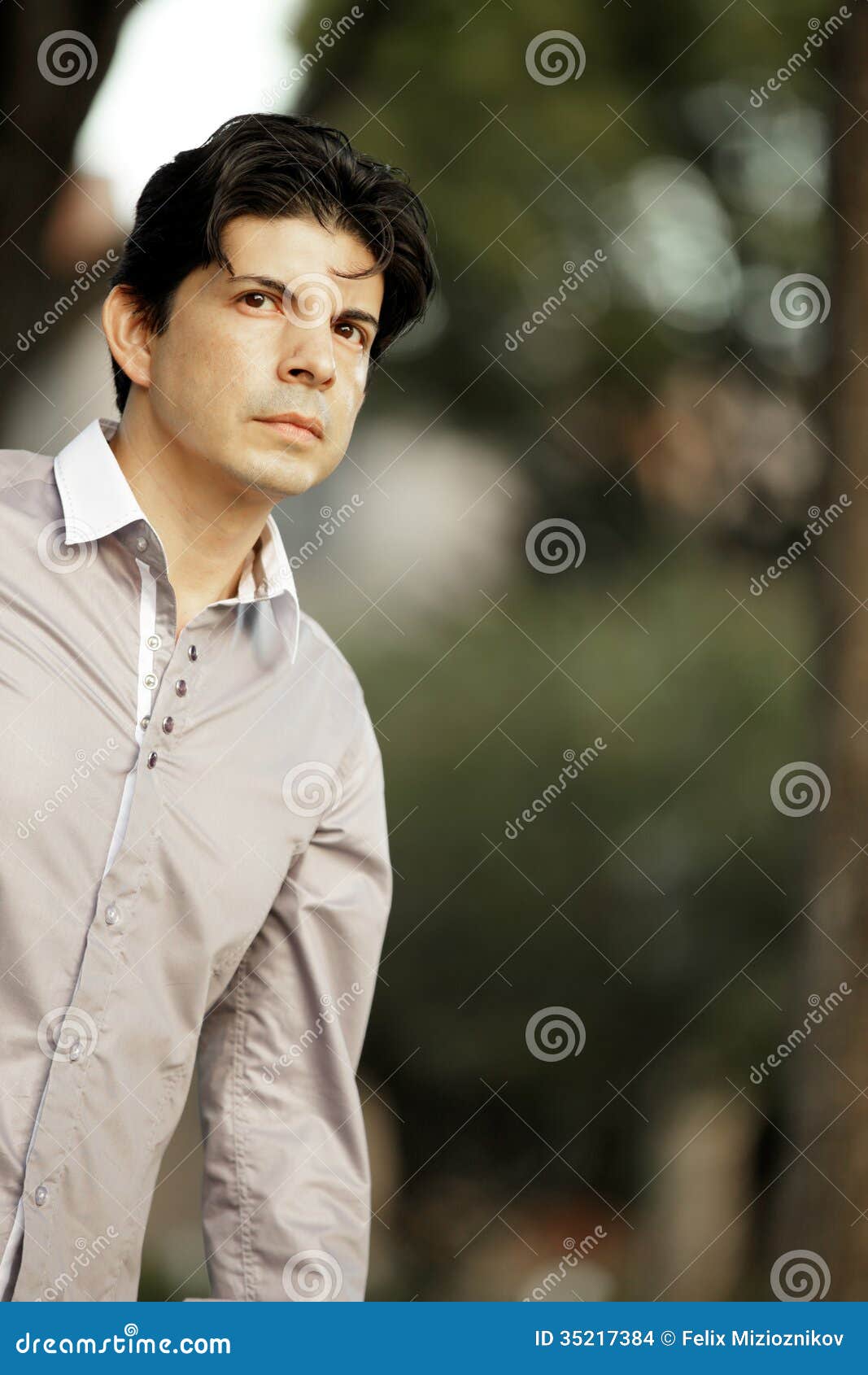 Man Looking Over the Camera Stock Photo - Image of shirt, blurry: 35217384